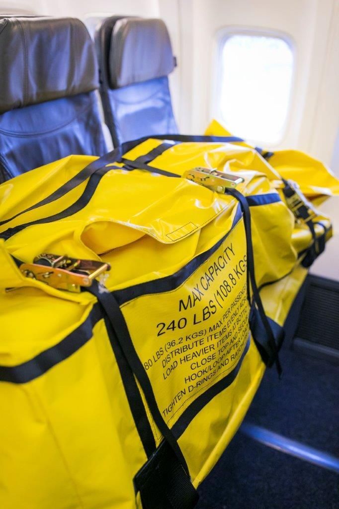 Alaska Air Cargo raises capacity with in-seat containers - Aircraft ...